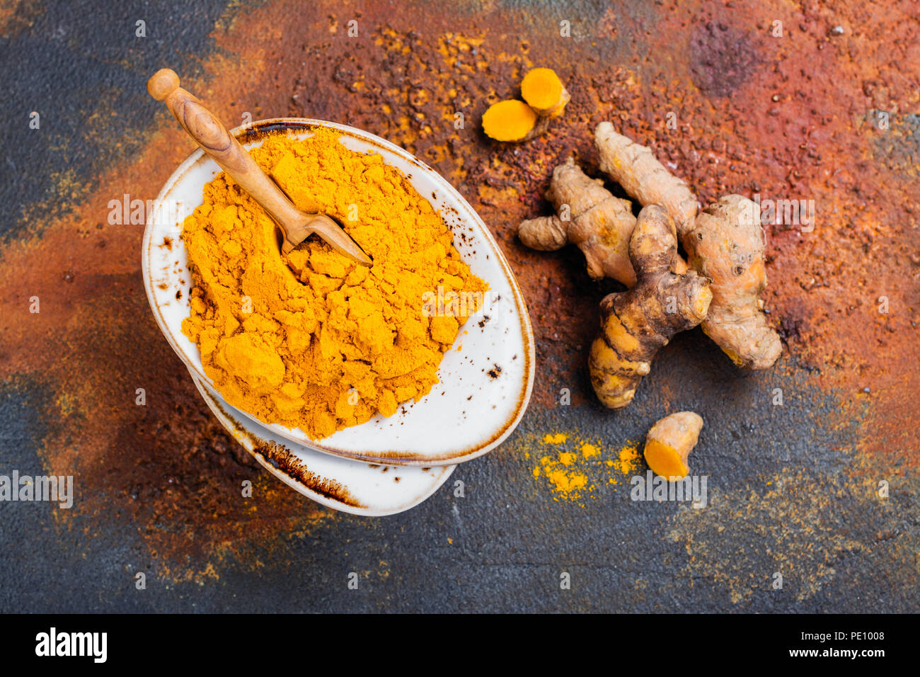 Turmeric oil powder root hi-res stock photography and images - Alamy