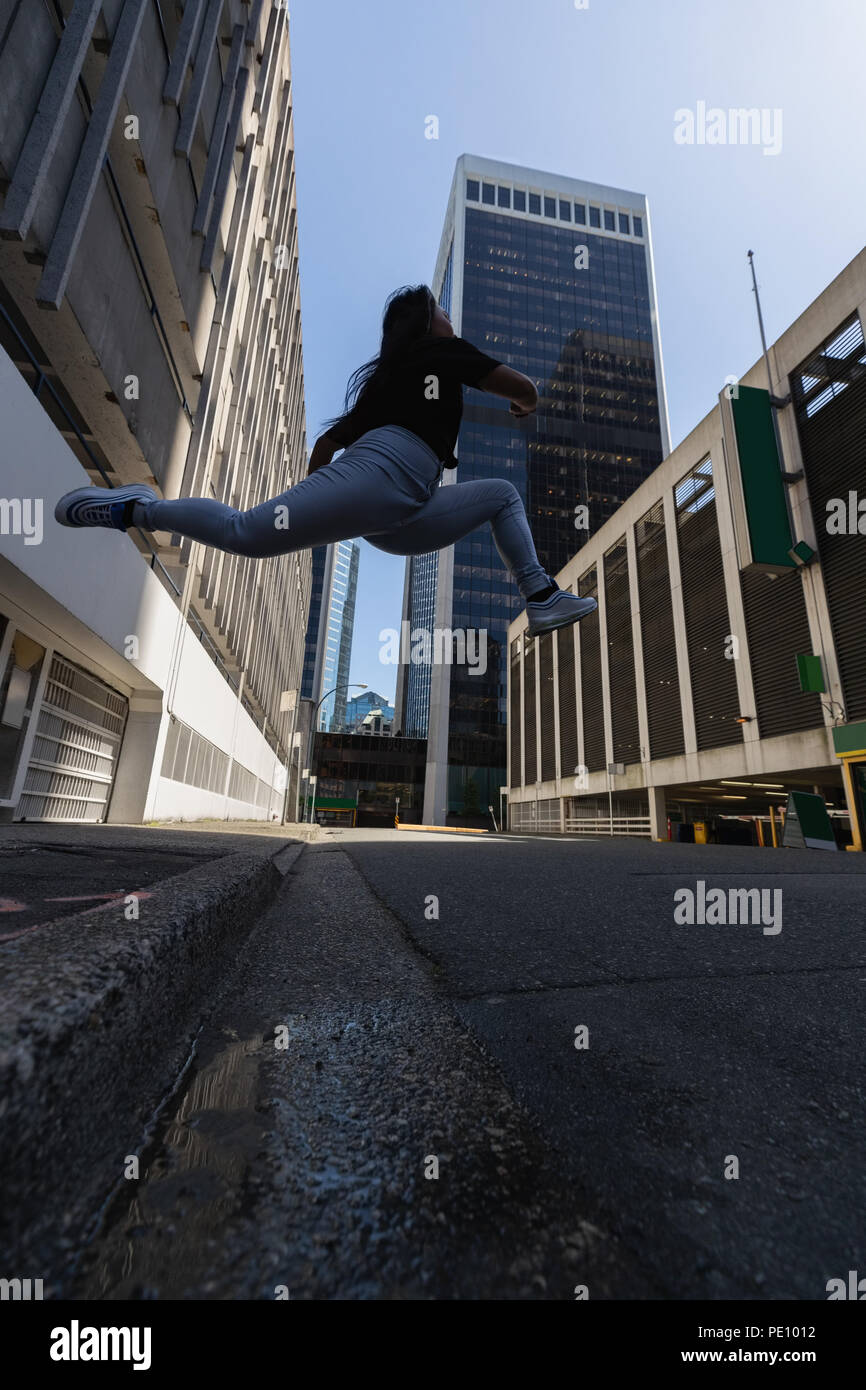 Female urban dancer dancing in street Stock Photo - Alamy