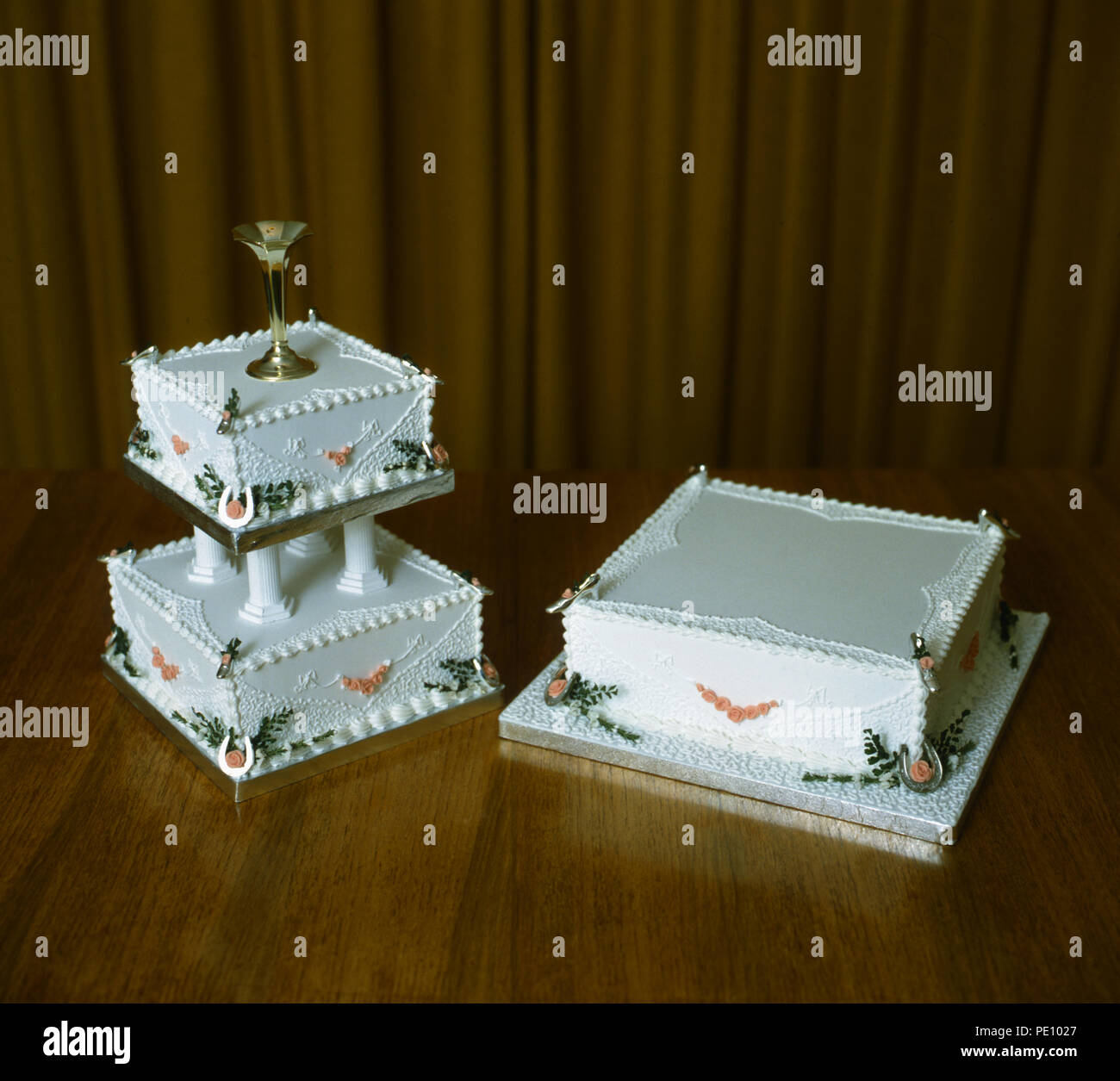 Three tier wedding cake part assembled Stock Photo - Alamy