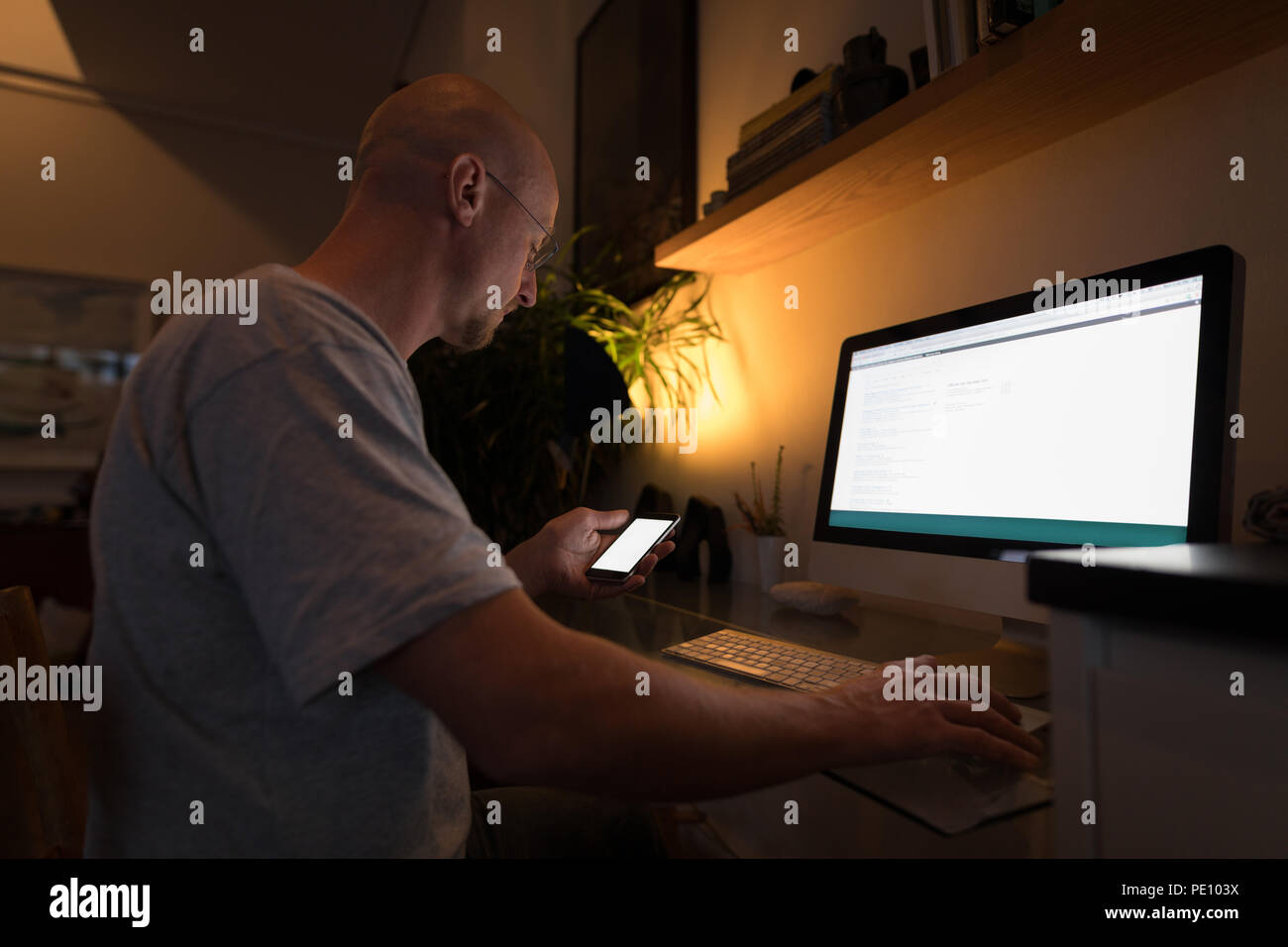 Working desktop computer using keyboard hi-res stock photography and ...