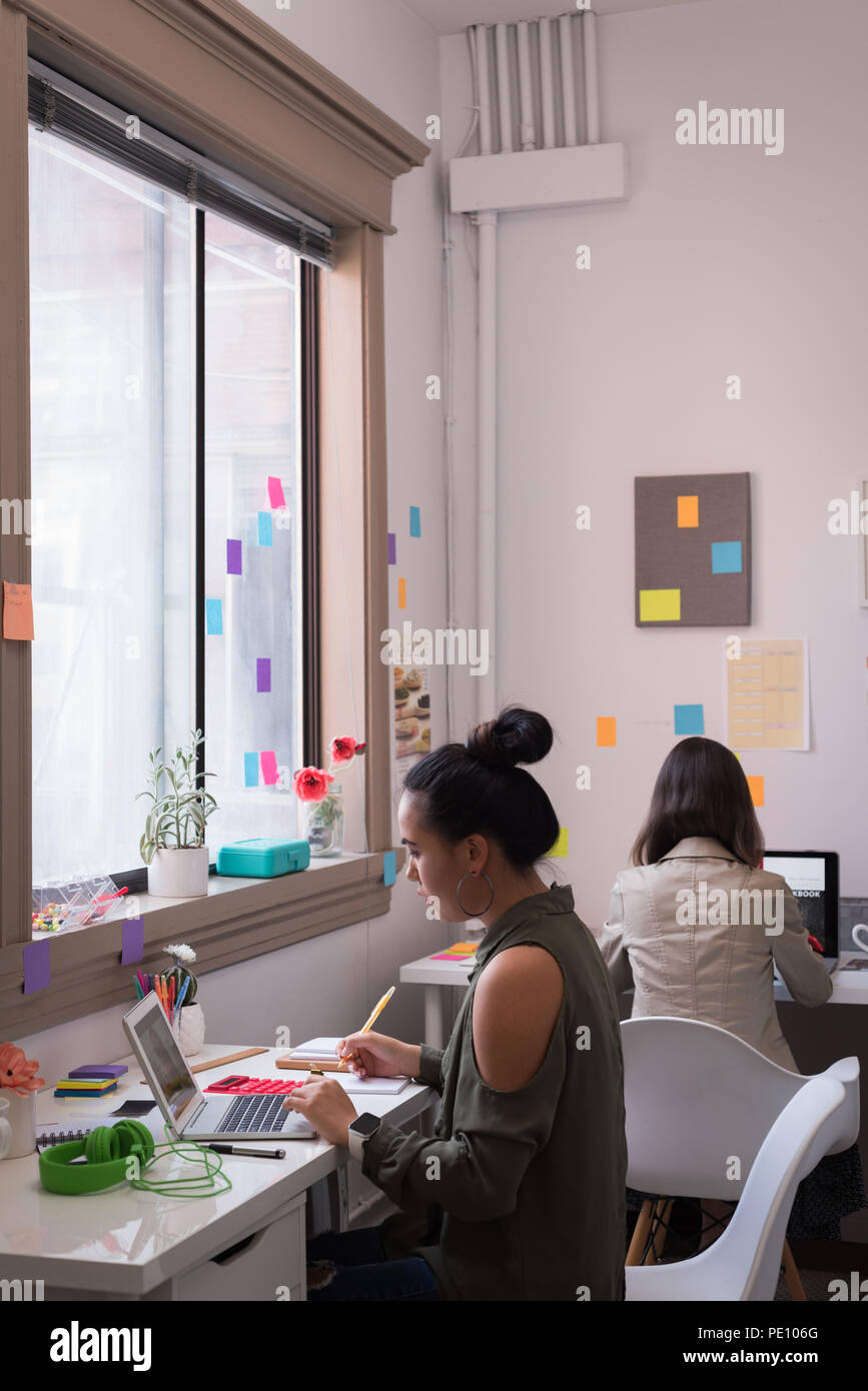 Fashion design studio with laptop hi-res stock photography and images ...