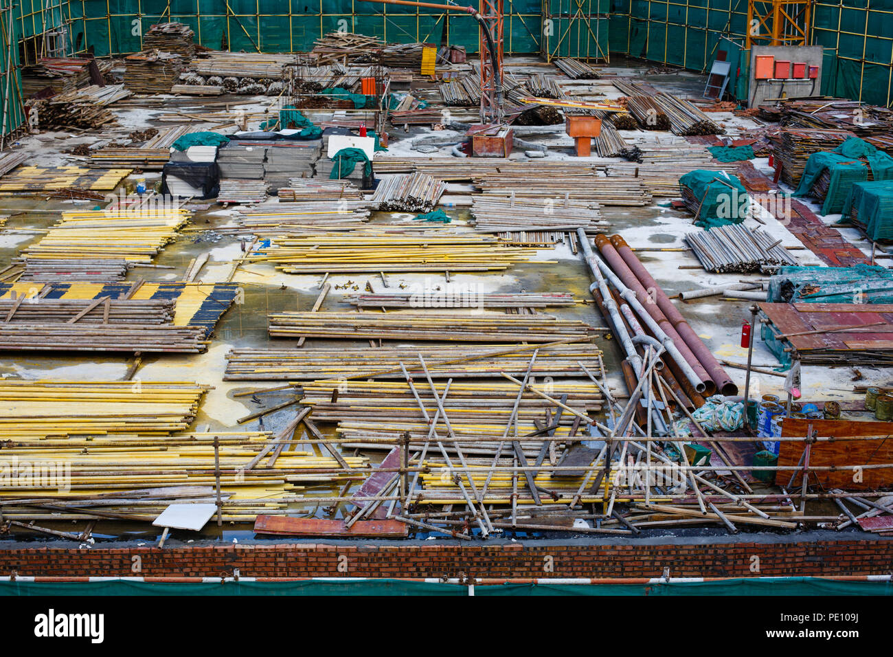 Various building materials piled up on the building construction site ...