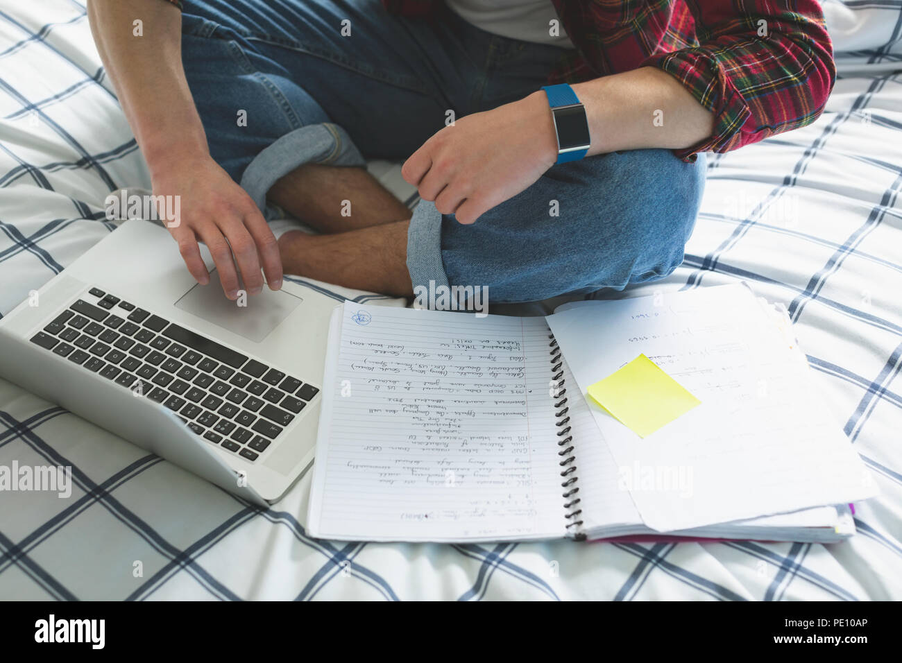 Young adult male working home hi-res stock photography and images - Alamy