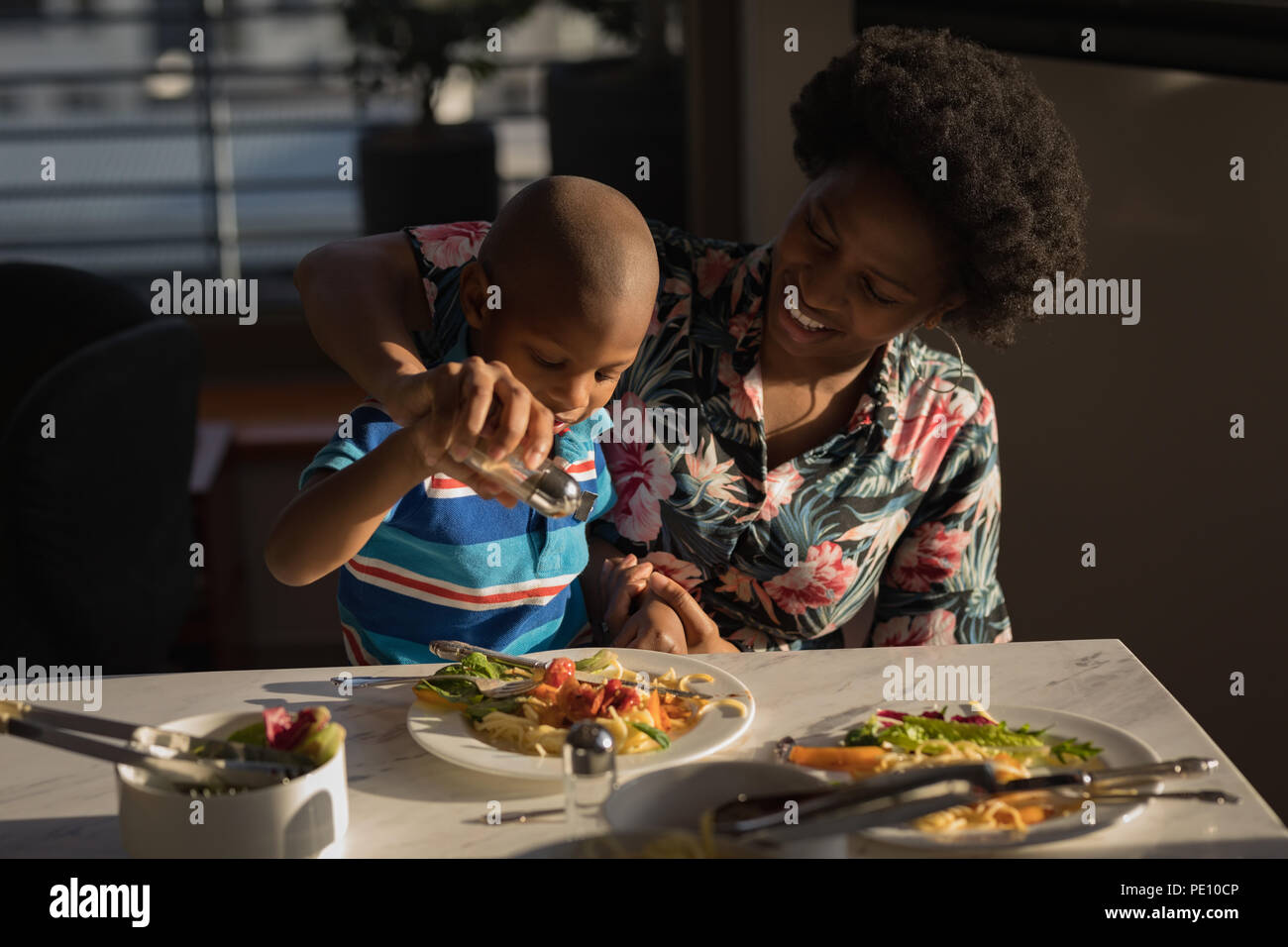 Boy salt food hi-res stock photography and images - Alamy