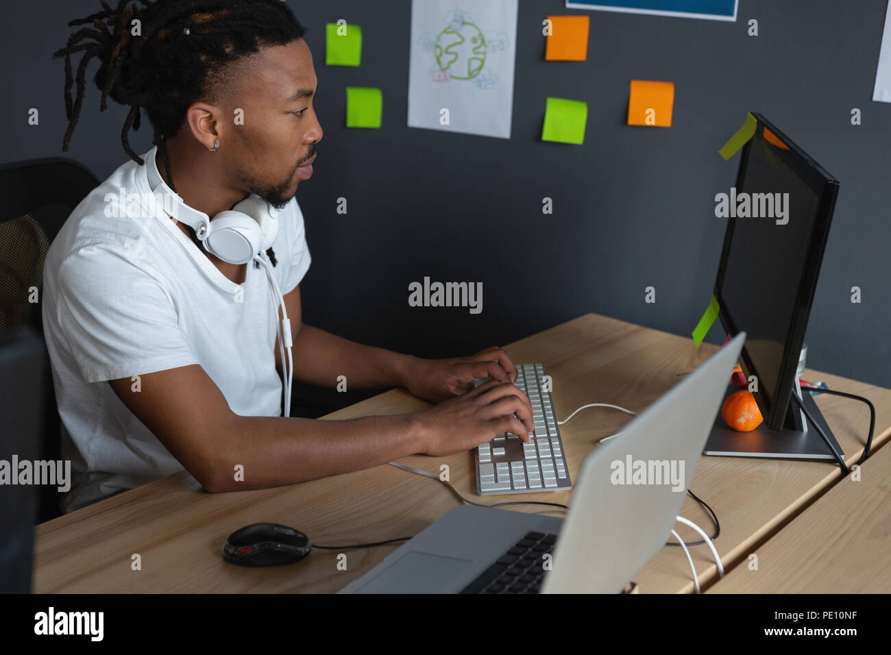 Male executive working at desk Stock Photo - Alamy