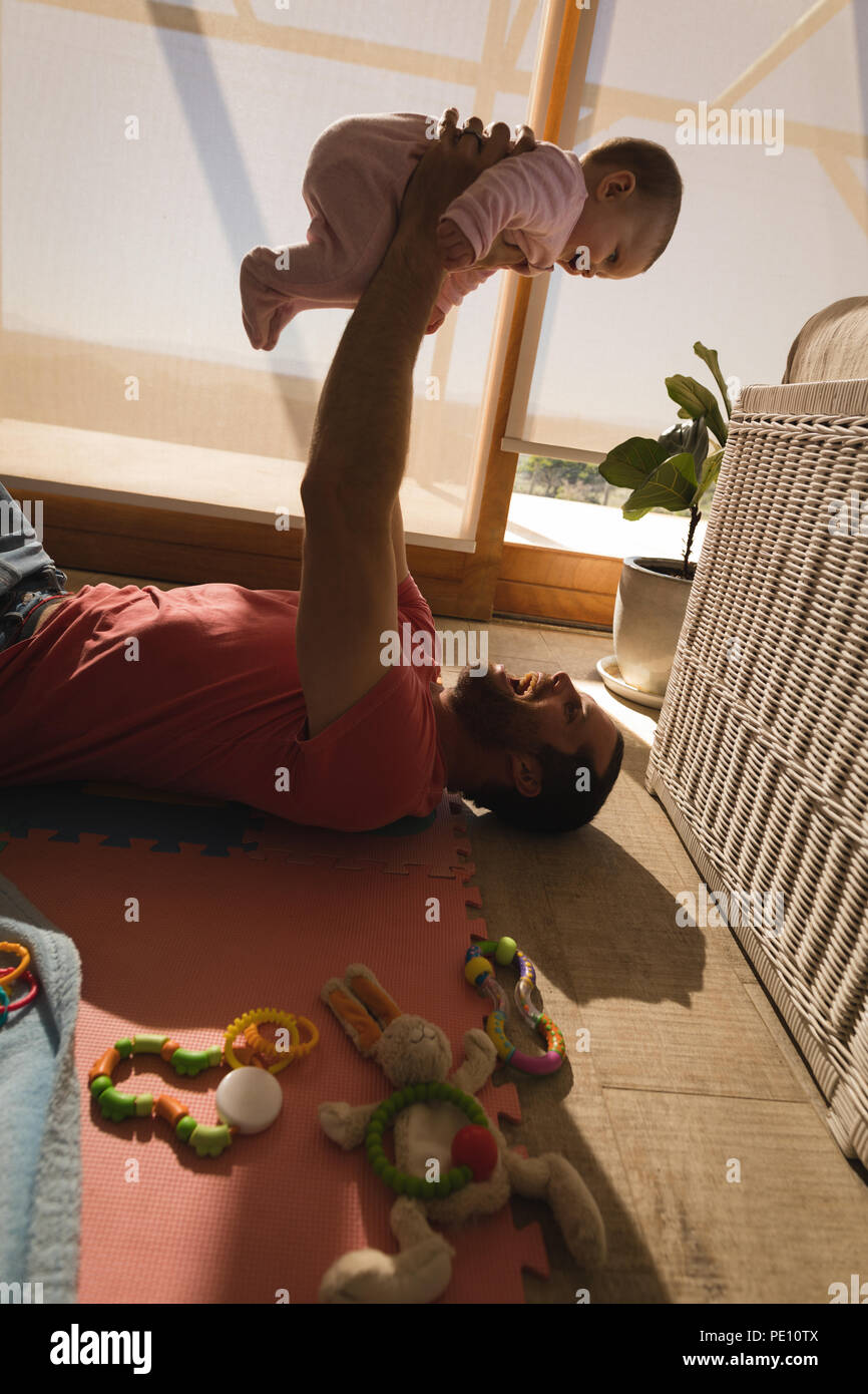 Father playing with his baby boy Stock Photo - Alamy