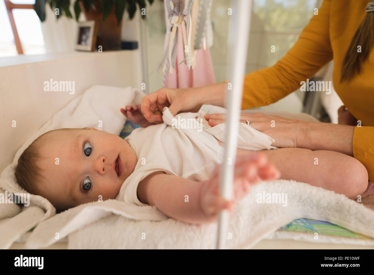 Changing diaper hi-res stock photography and images - Alamy