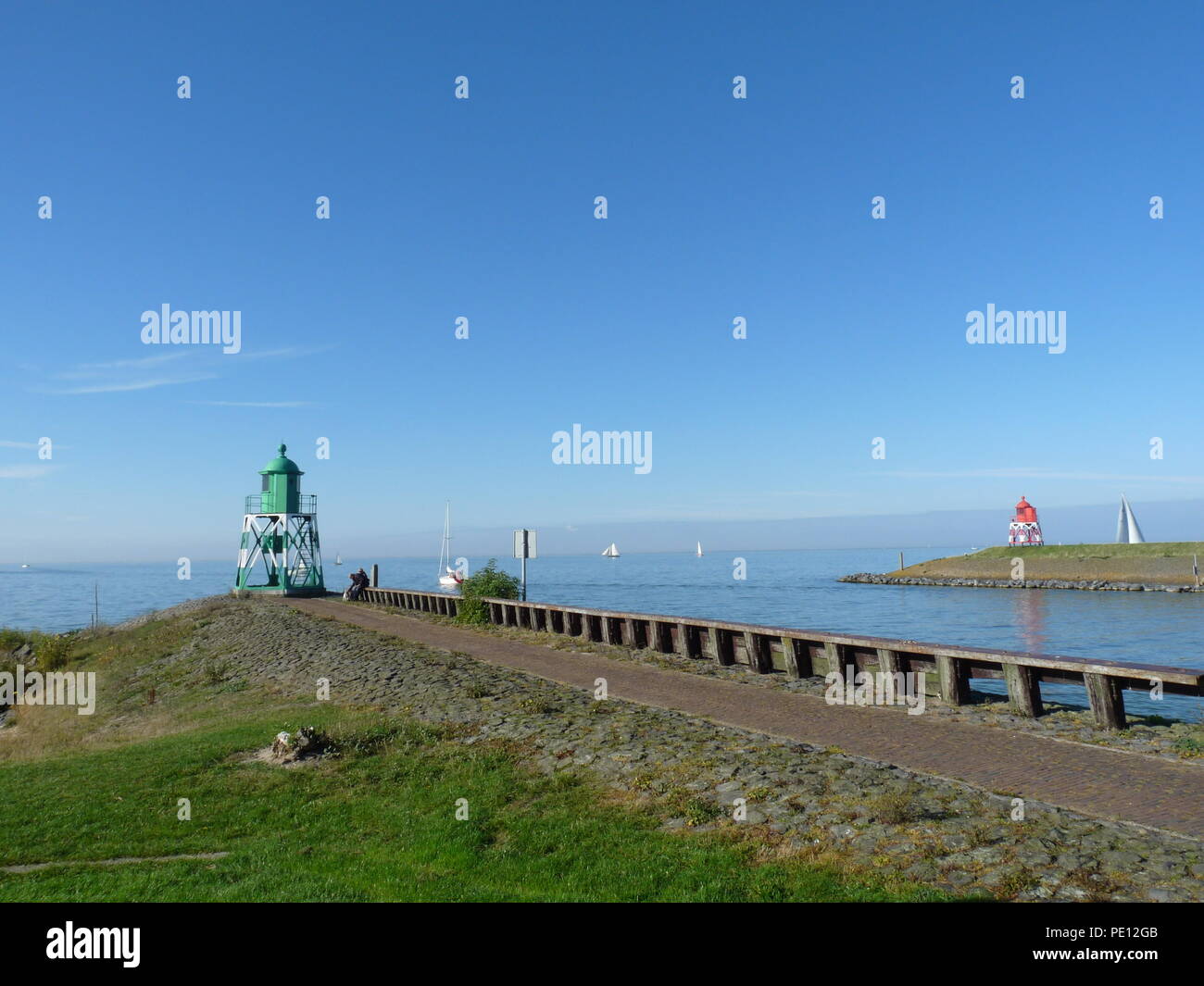 Red lighthouse on green hi-res stock photography and images - Alamy