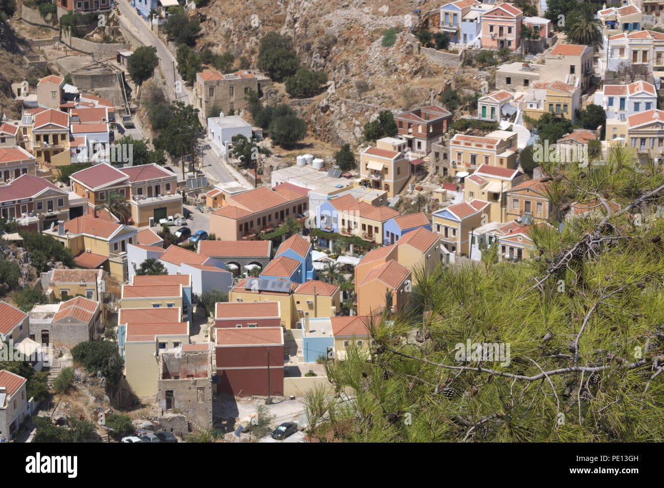 View of the houses of the port of Symi, Greece. Ariel view of the town ...