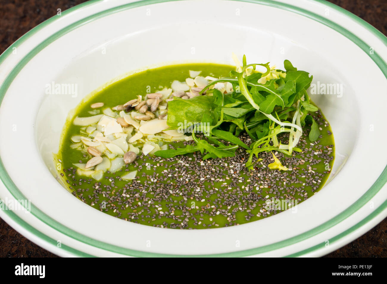 Delicious vegetable green soup with groats Stock Photo - Alamy