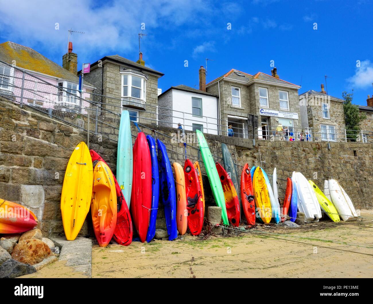 Colourful Kayaks in Mousehole, fishing village,Cornwall,England,UK ...