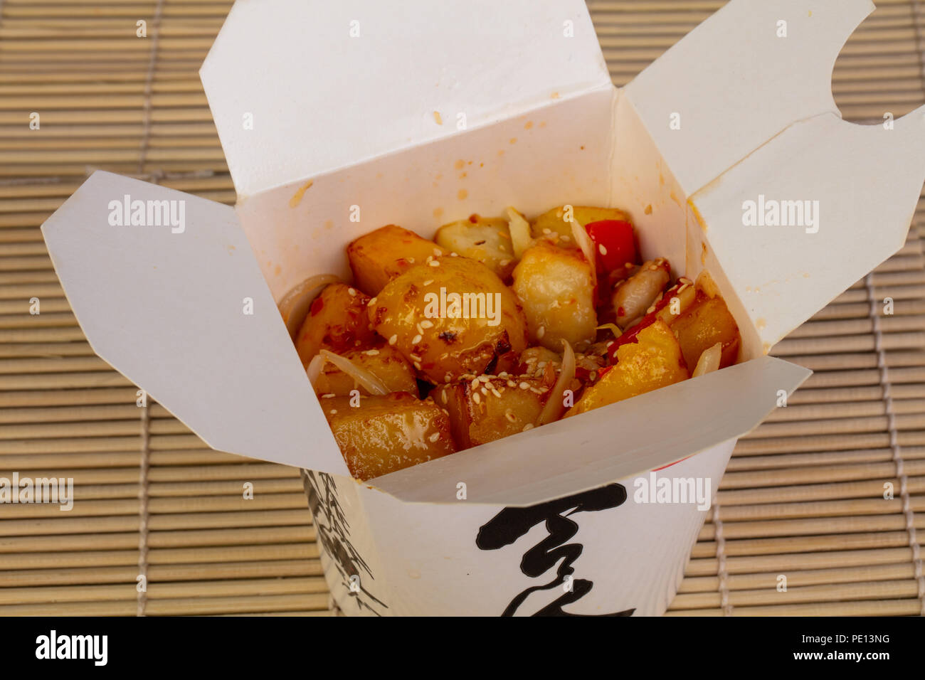 Delicious box of chicken with thai sauce and vegetables Stock Photo - Alamy