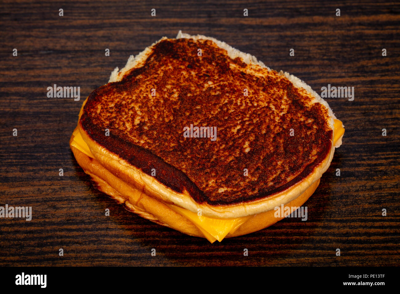 Toast with cheese over wooden Stock Photo - Alamy