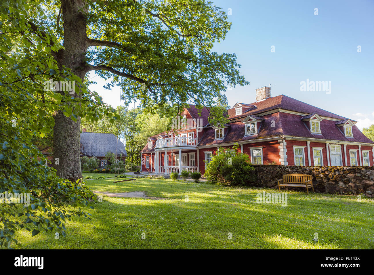 Old big wooden house in the park. Traditional scandinavian styled ...