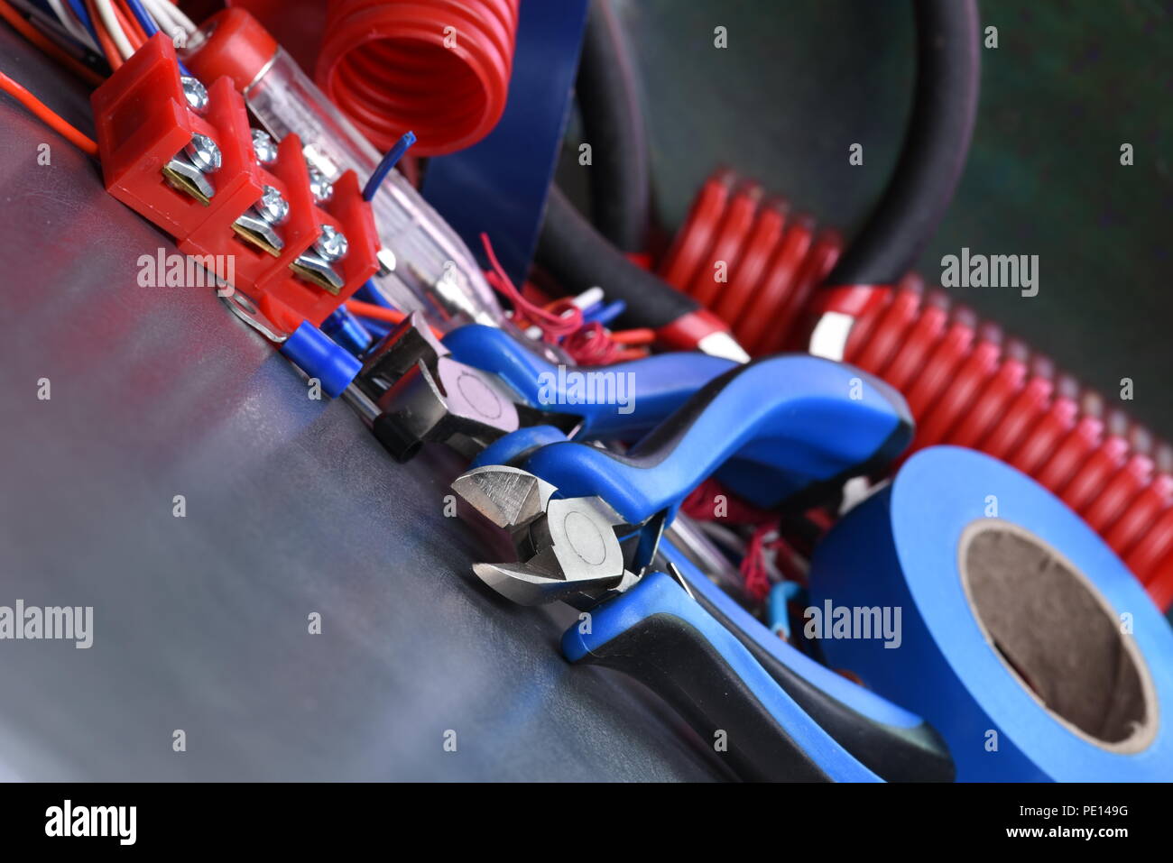 Set of components and tools for use in electrical installations on ...