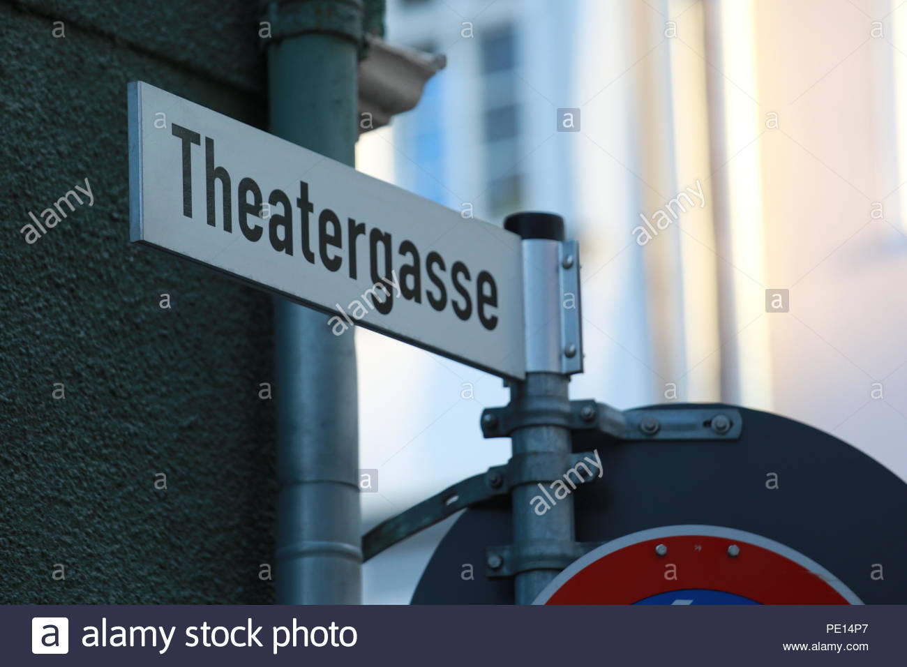 A sign in German indicating the name of a lane known as Theatergasse in ...