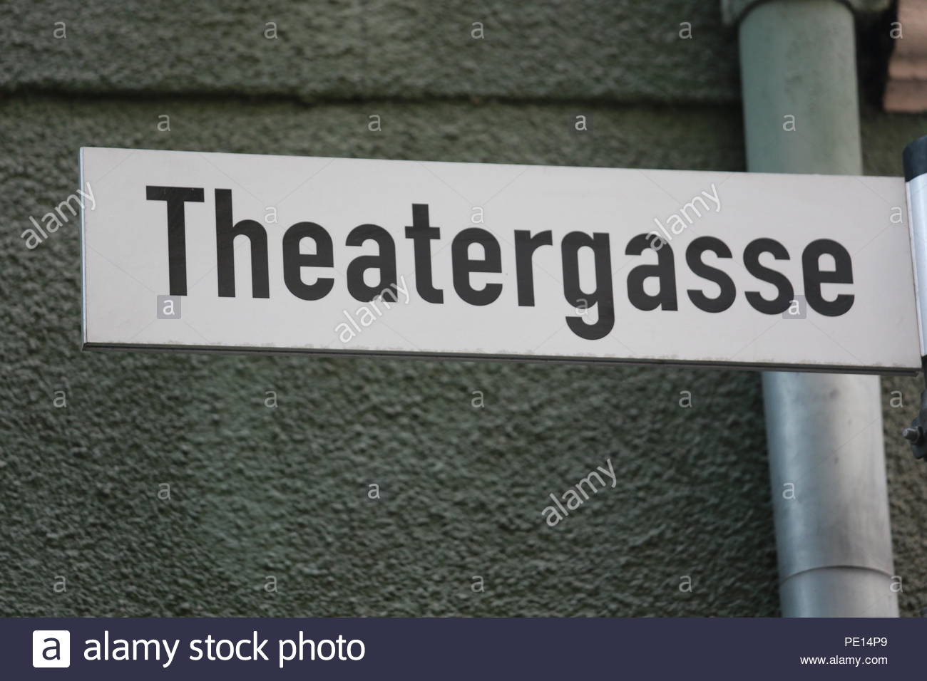 A sign in German indicating the name of a lane known as Theatergasse in ...