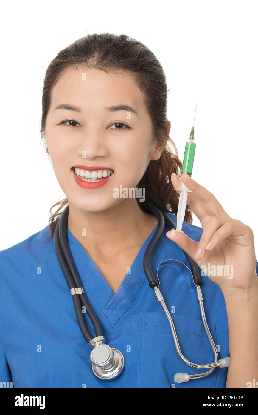 Evil Asian doctor or nurse holding a syringe filled with green ...