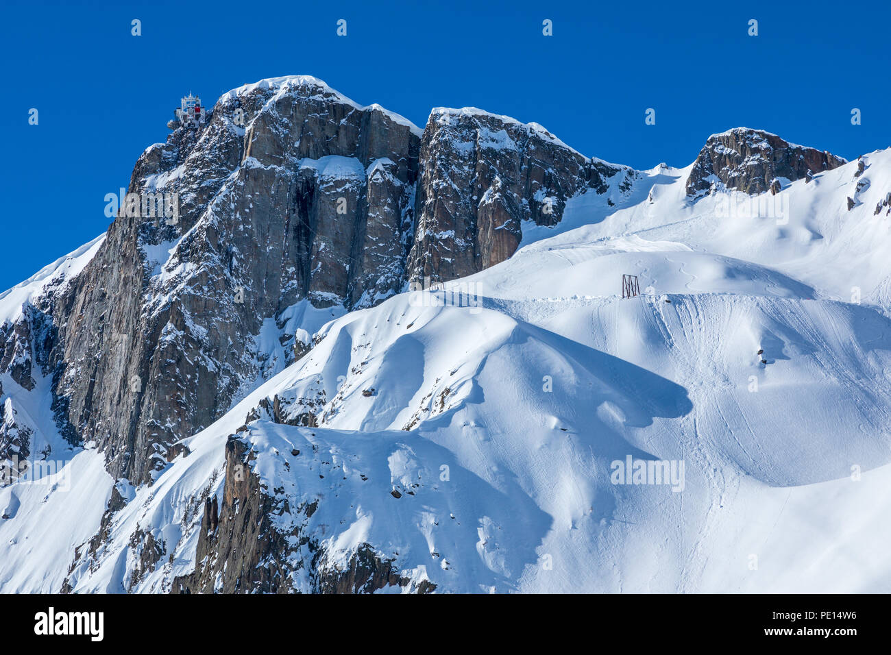 Brevent above Chamonix in the French Alps. The cable car is leaving to ...