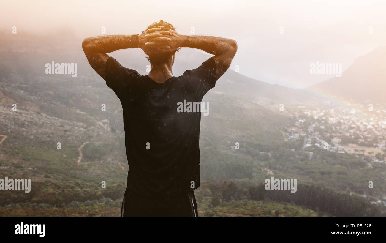 Man standing from behind hi-res stock photography and images - Alamy