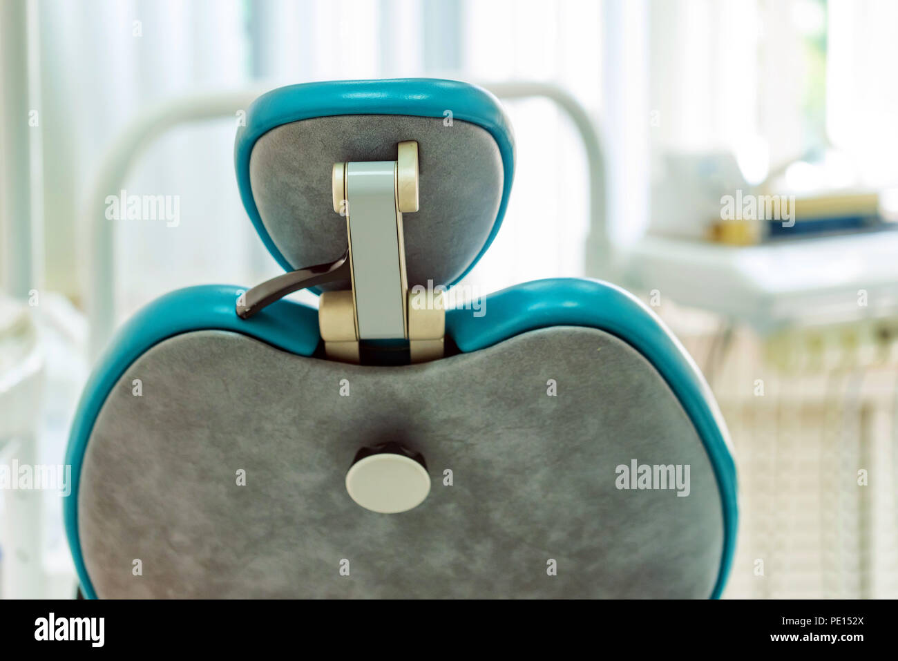 Dentist's chair in the office back view Stock Photo - Alamy