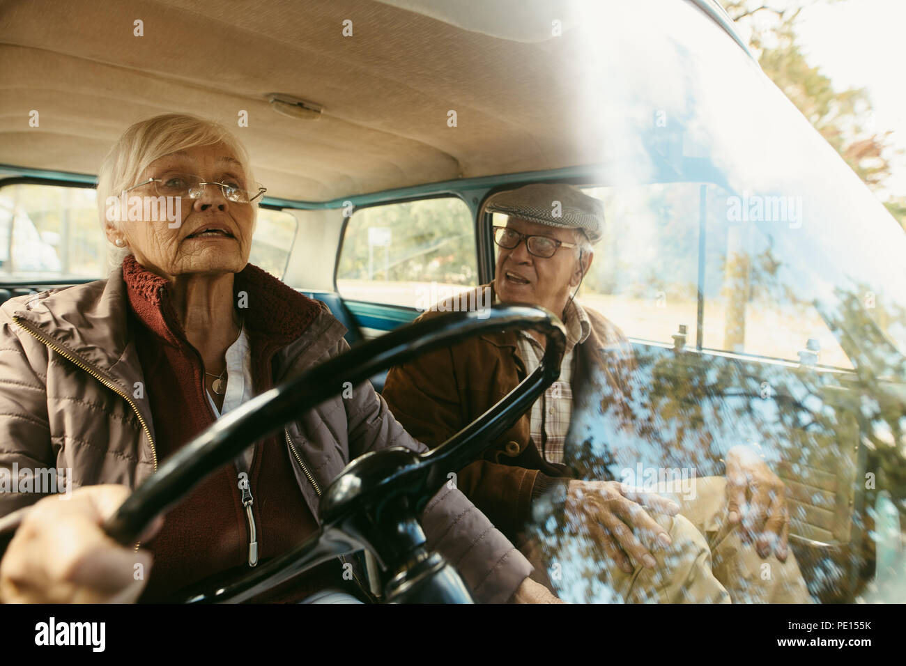 Elderly couple driving hi-res stock photography and images - Alamy