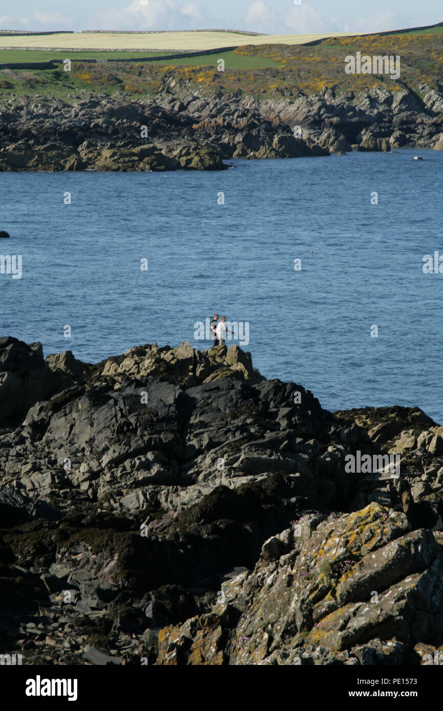 Two men on river rocks two men on river rocks hi-res stock photography ...