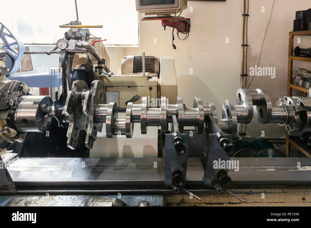machining of engine parts, grinding crankshafts Stock Photo - Alamy