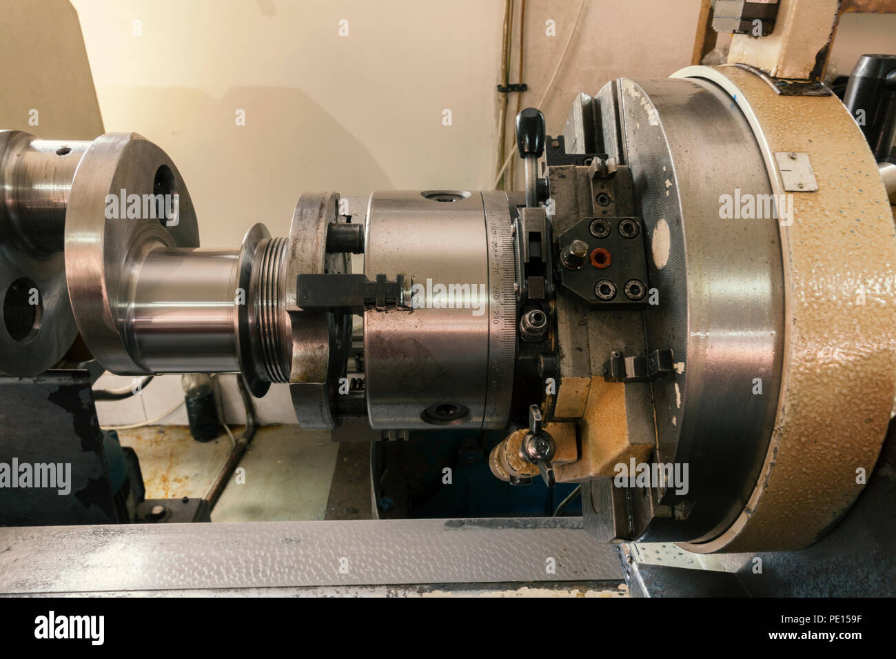 machining of engine parts, grinding crankshafts Stock Photo - Alamy