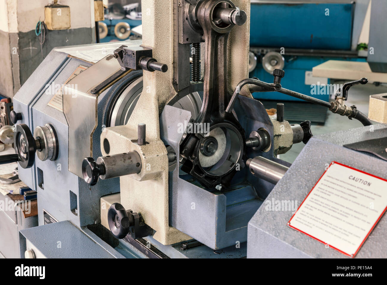 grinding cylinder head and valve seats Stock Photo - Alamy