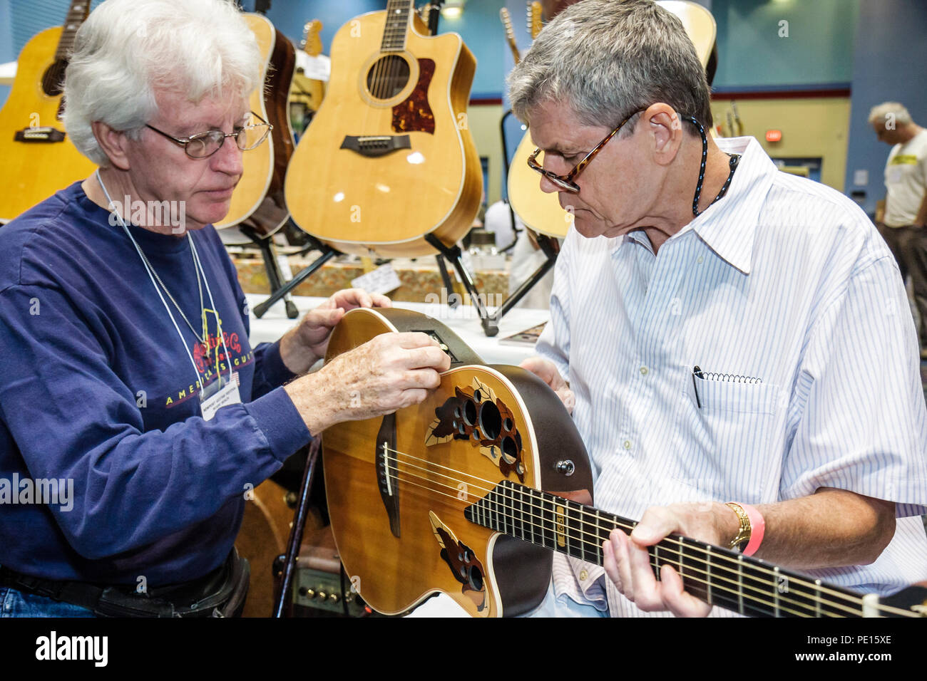 Buying a vintage electric guitar hi-res stock photography and images ...