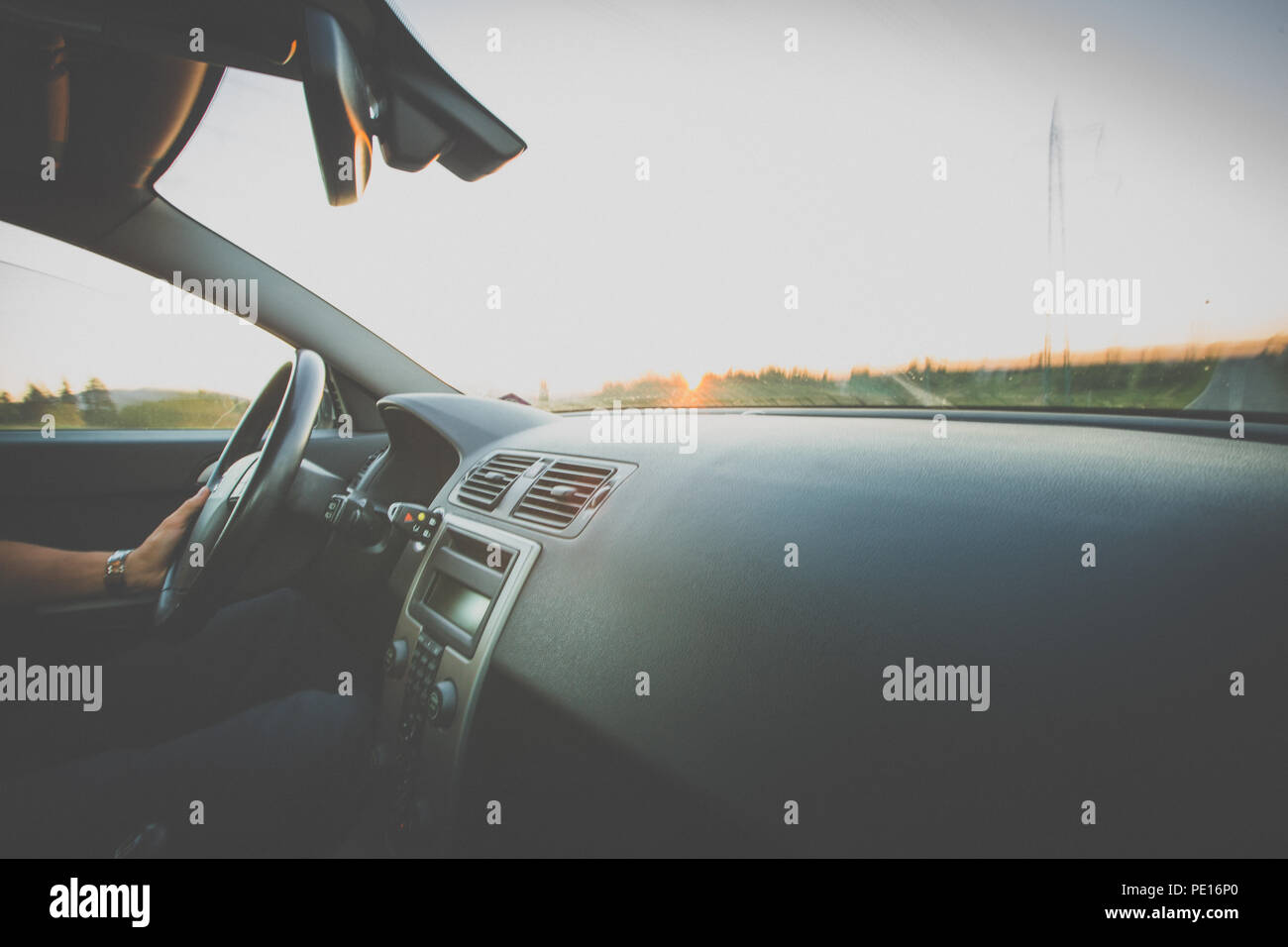 Man driving a car moving fast on a highway (motion blurred image Stock ...