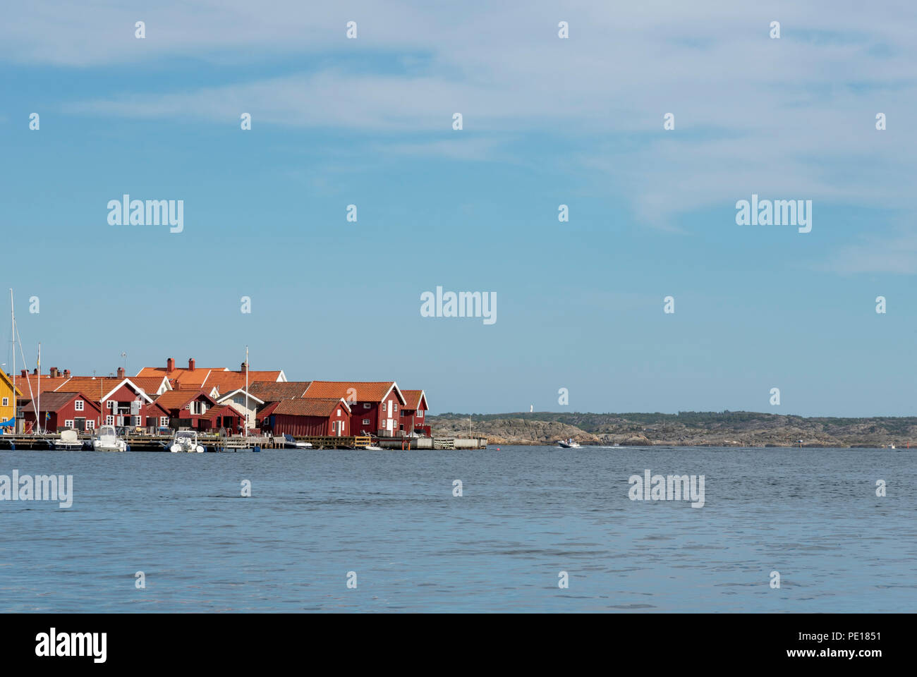 Traditional boathouses at Swedish west coast Stock Photo - Alamy
