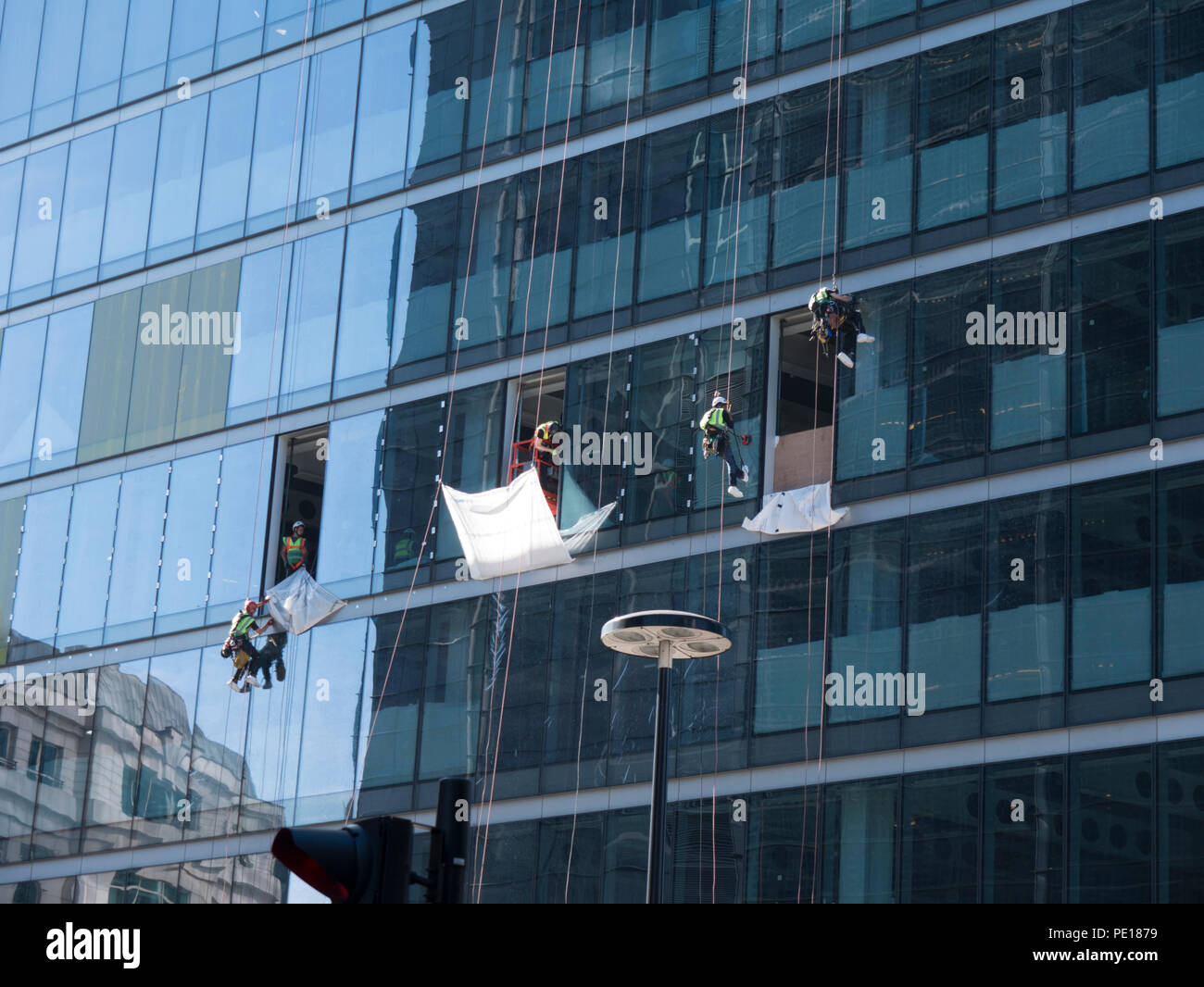 Replacing windows in a high rise building 100 Bishopsgate, London Stock ...
