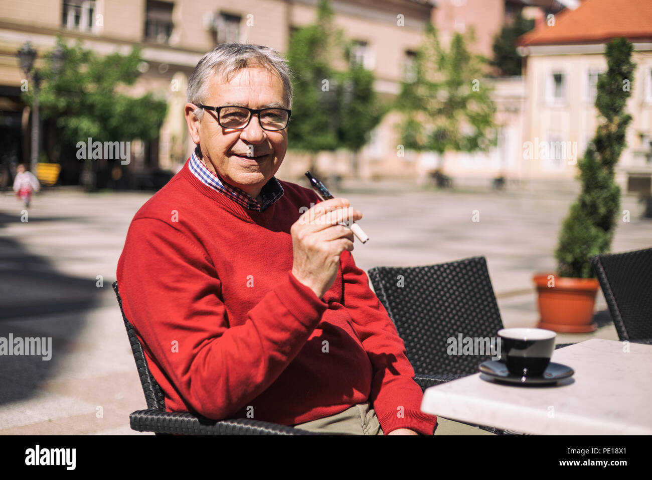 Man smoking cigarette drinking coffee hi-res stock photography and ...