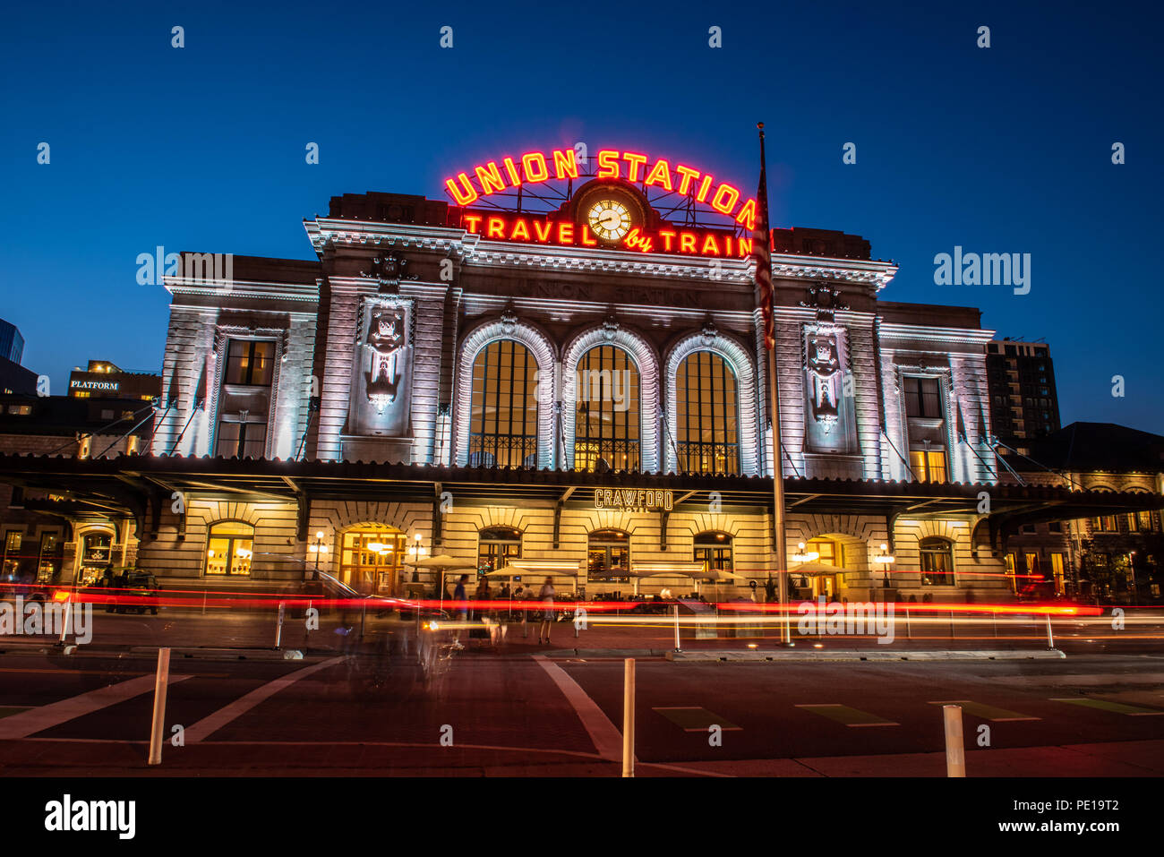 Vintage Union Station transportation center at dusk with streaking ...