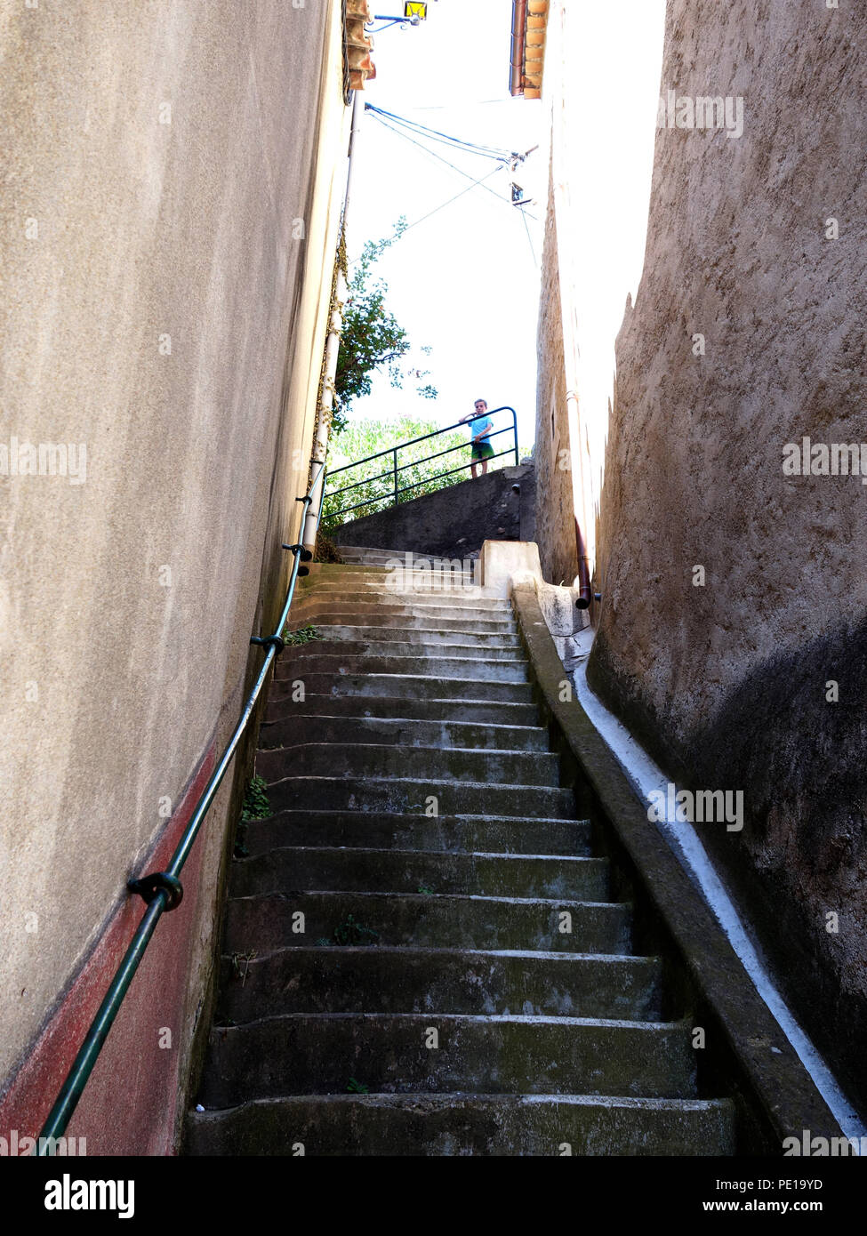 Very steep stone steps in the old village of Cessenon-sur-Orb, France ...