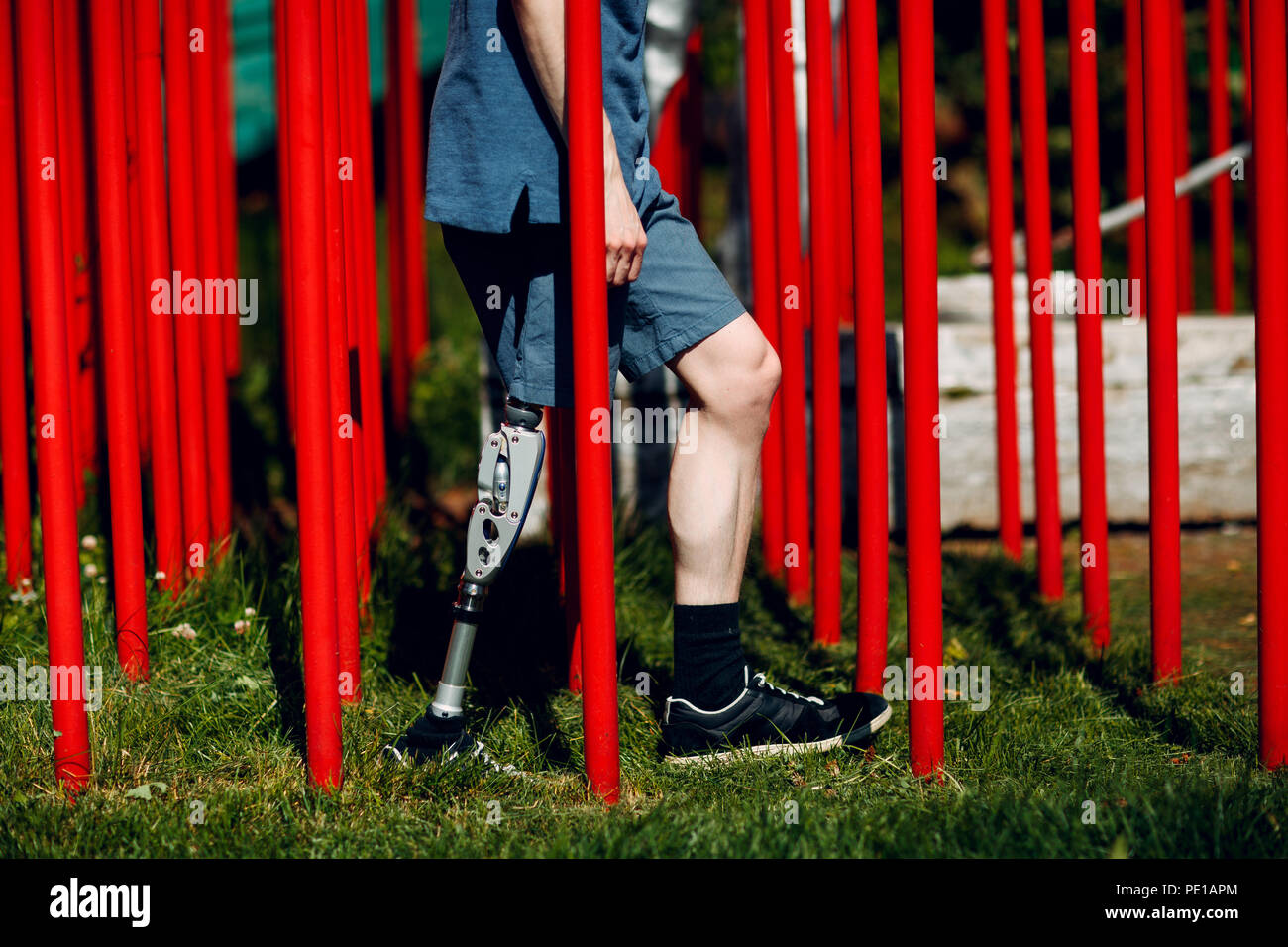 Disabled young man with foot prosthesis Stock Photo - Alamy