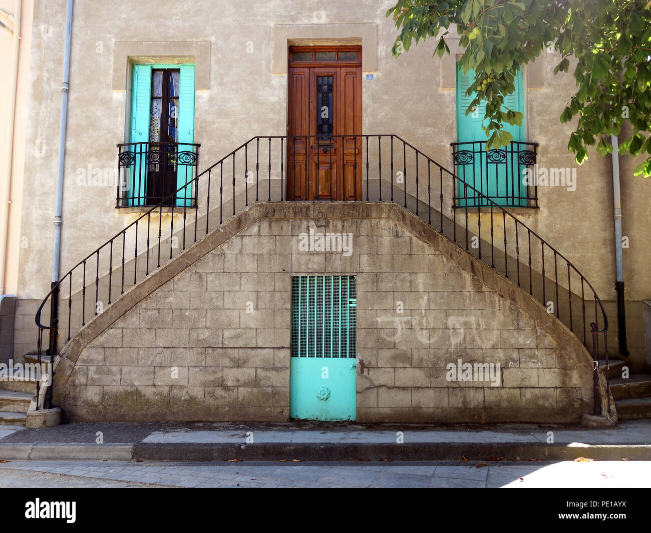 Pretty steps leading two ways up to the front door exterior of a very ...