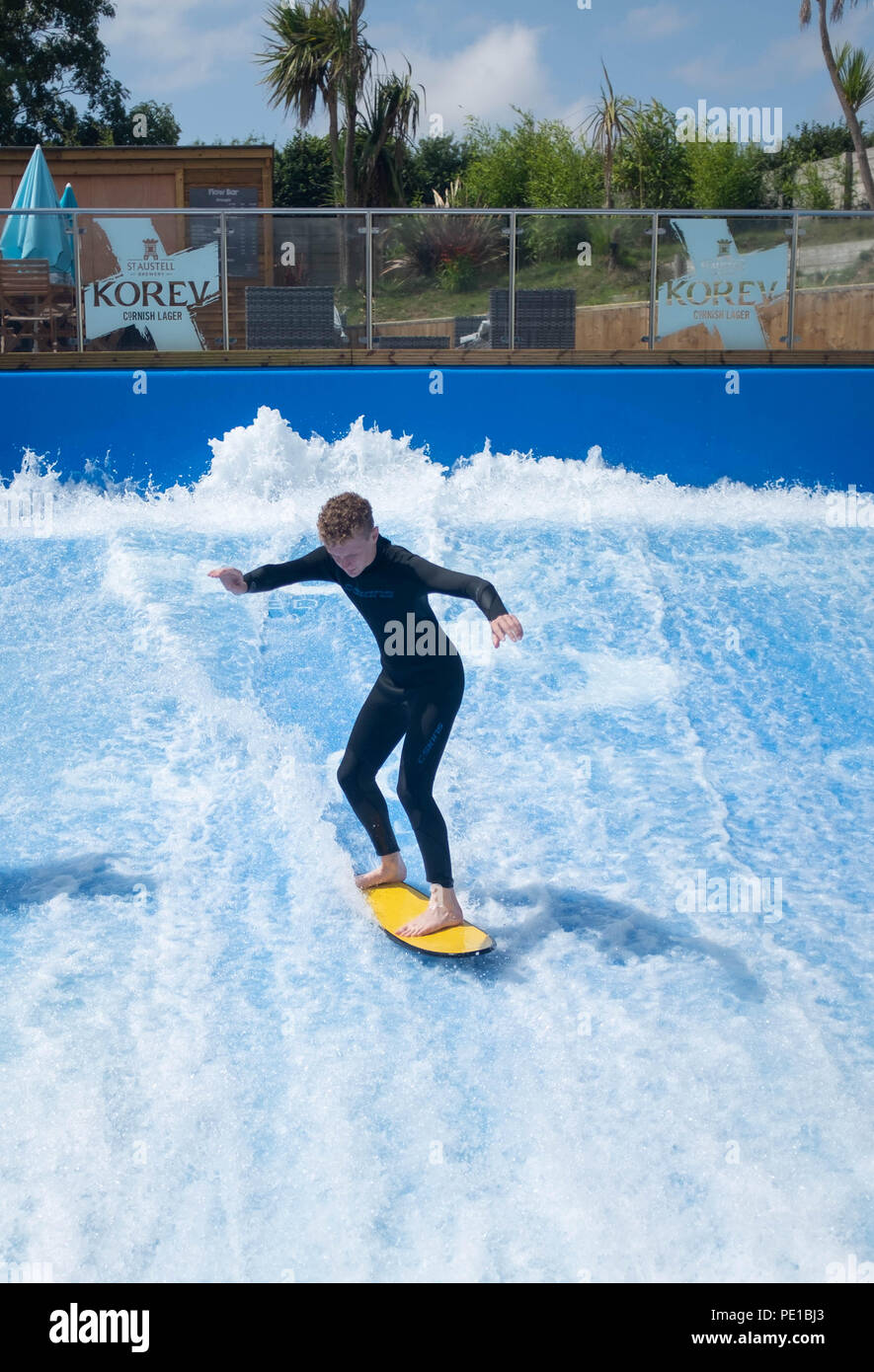 Flowrider surfing in Cornwall Stock Photo - Alamy