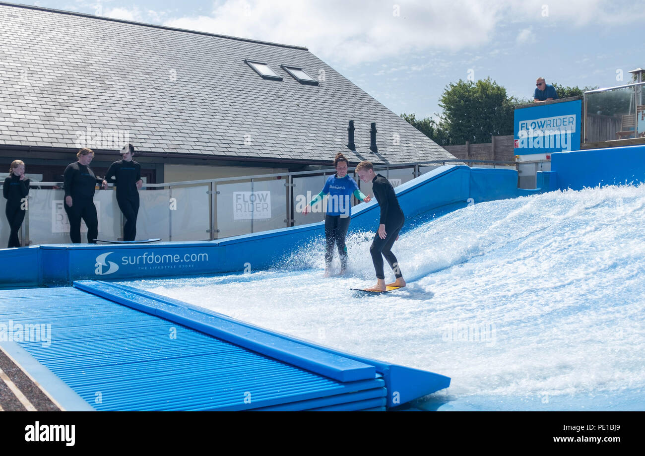 Flowrider surfing in Cornwall Stock Photo - Alamy