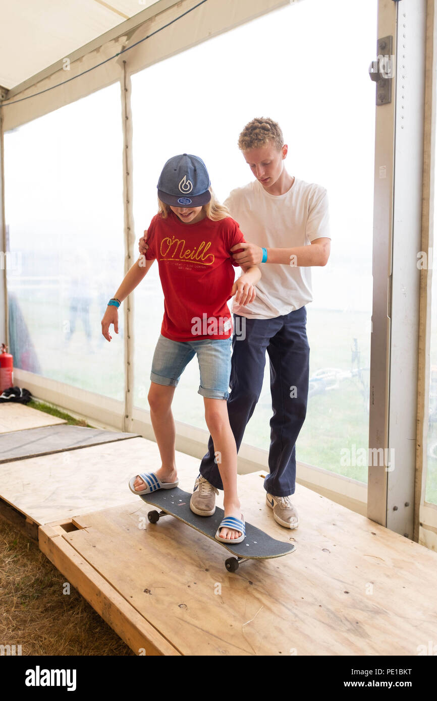 Sister teaching brother hi-res stock photography and images - Alamy