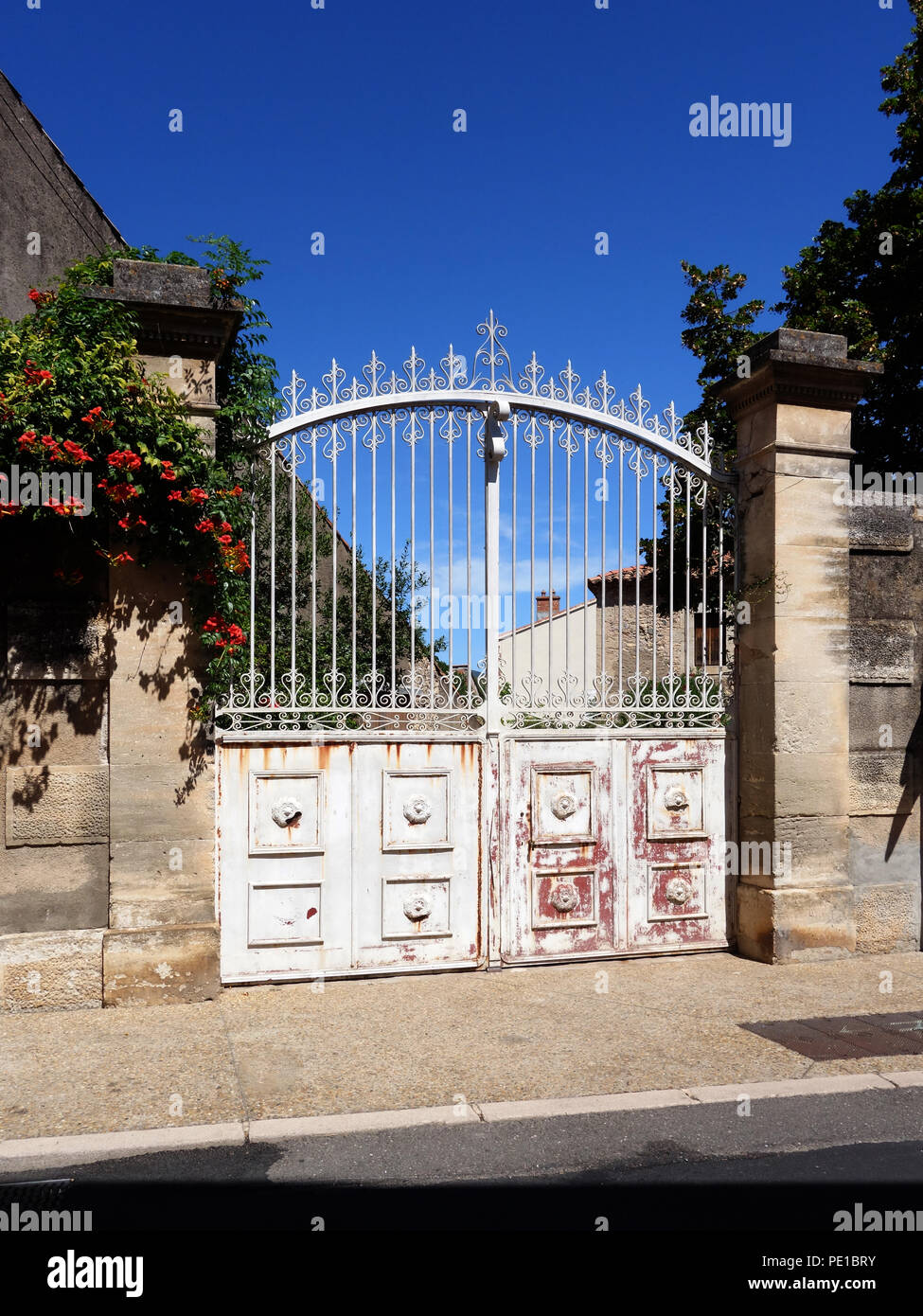 Very large garden gate of a village house in Cessenon-sur-Orb, France ...
