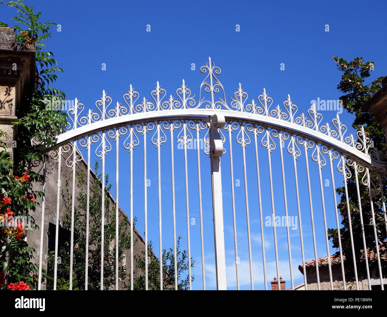 Very large garden gate of a village house in Cessenon-sur-Orb, France ...