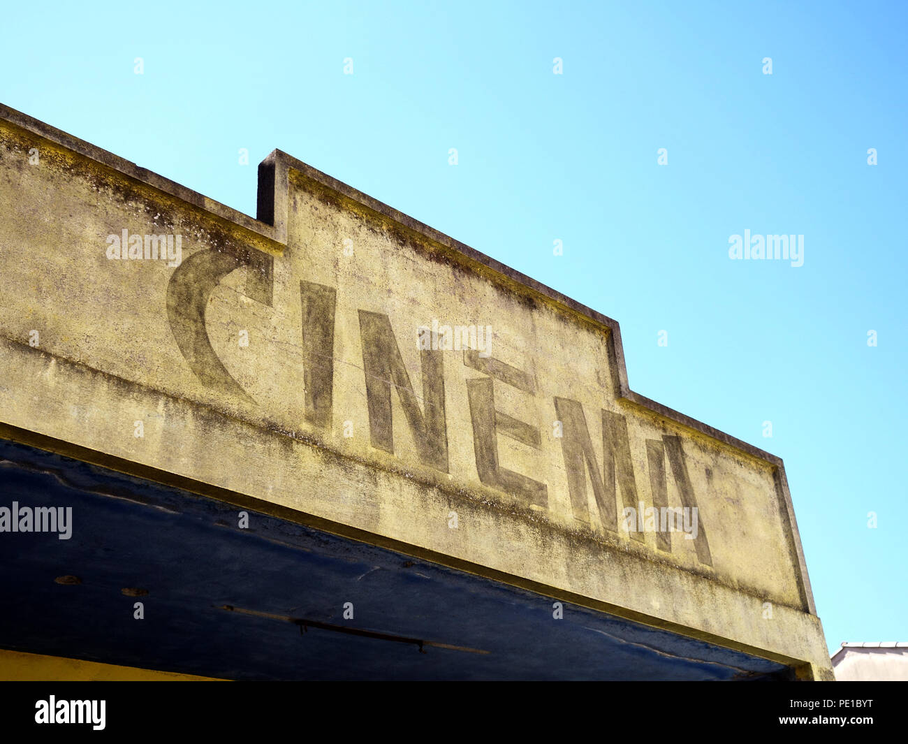 Very old Cinema sign written on the wall above the old cinema door in ...