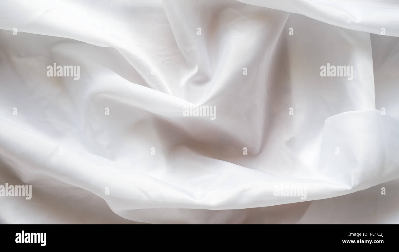 White Synthetic Lining Fabric with Folds. Crumpled Sheet or Clothes ...