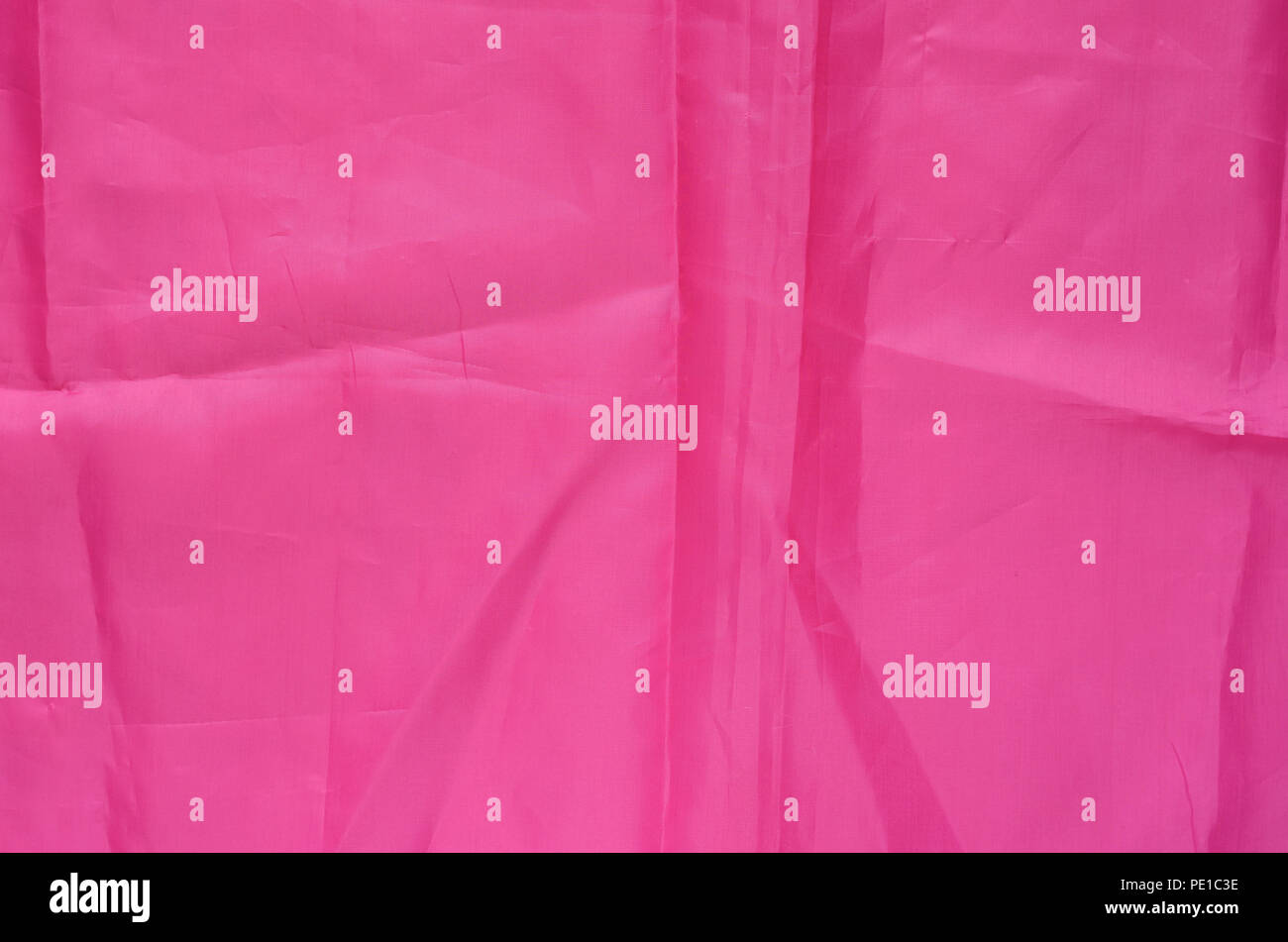 Pink Synthetic Lining Fabric with Folds. Crumpled Sheet or Clothes ...