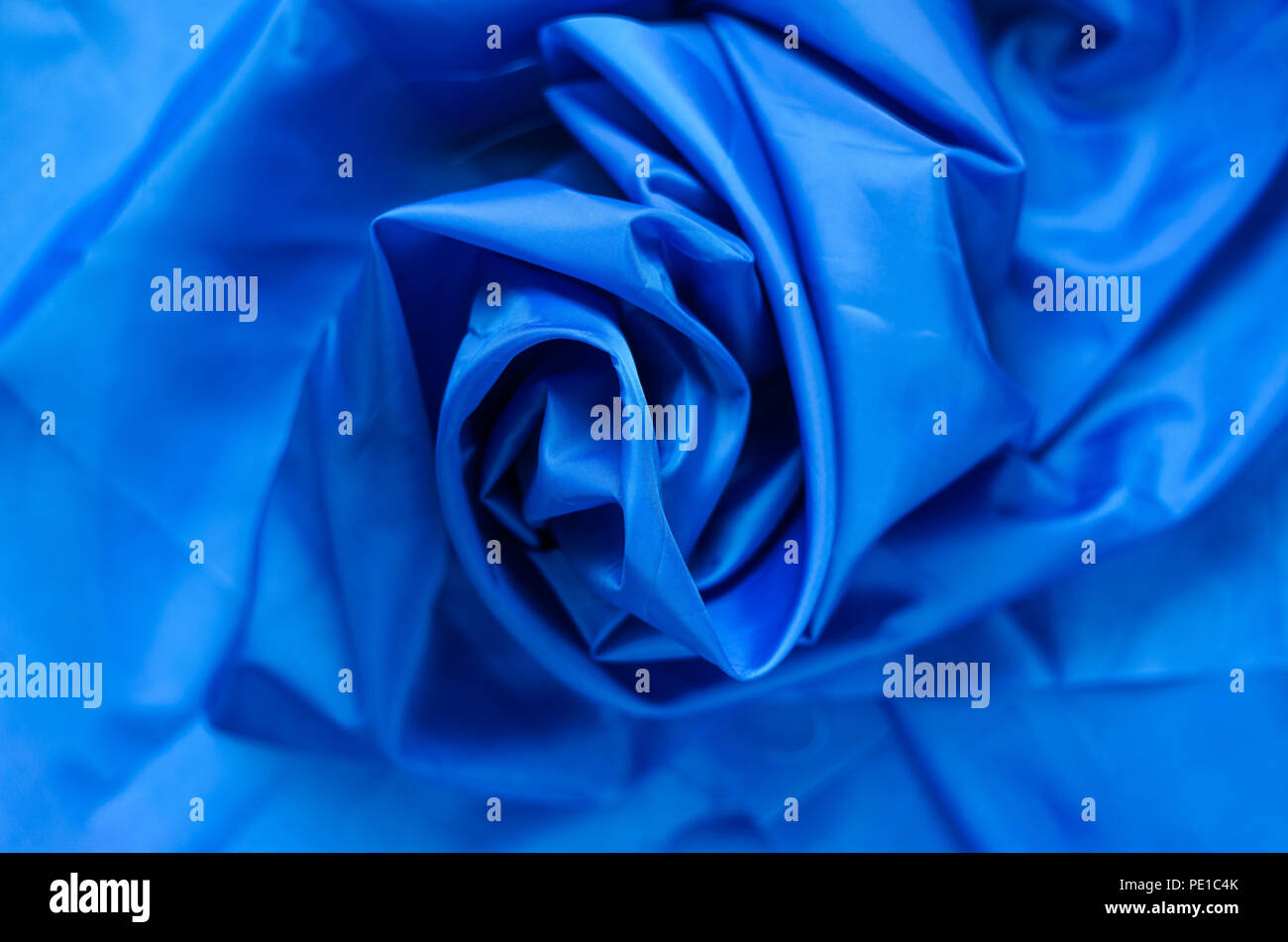 Blue Synthetic Lining Fabric with Folds. Crumpled Sheet or Clothes ...