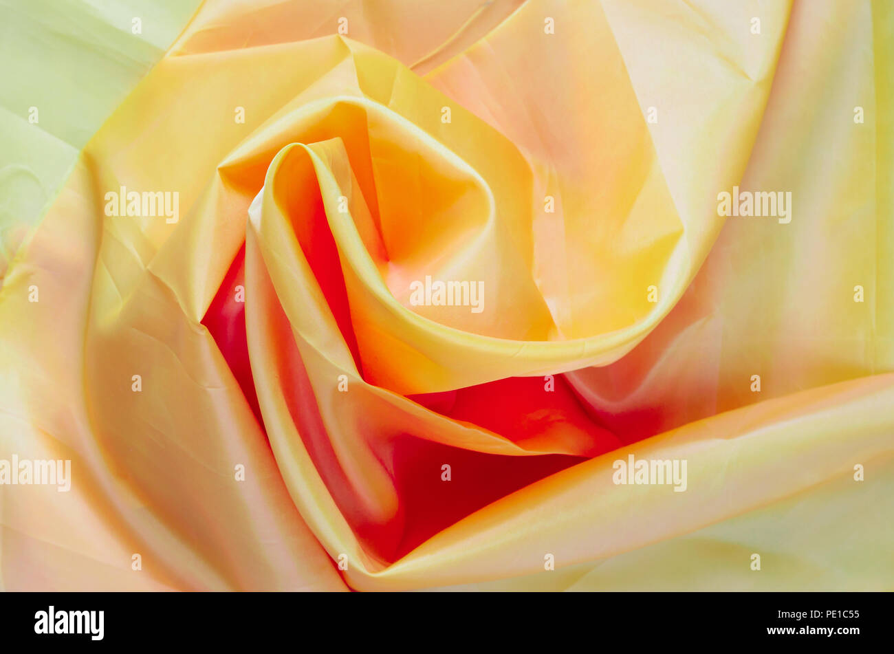 Yellow Synthetic Lining Fabric with Folds. Crumpled Sheet or Clothes ...