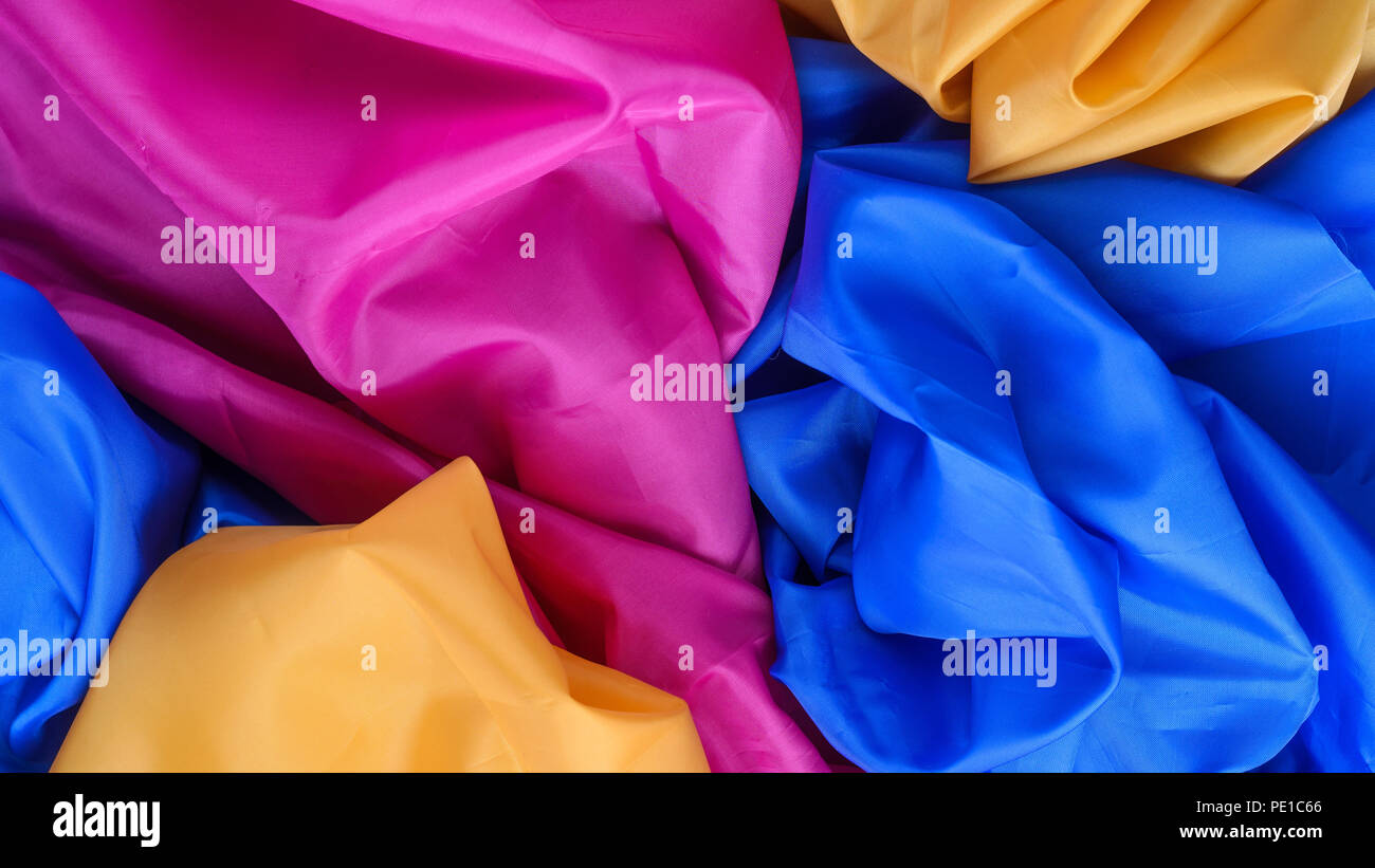 Three Different Colors Synthetic Lining Fabric with Folds Background ...
